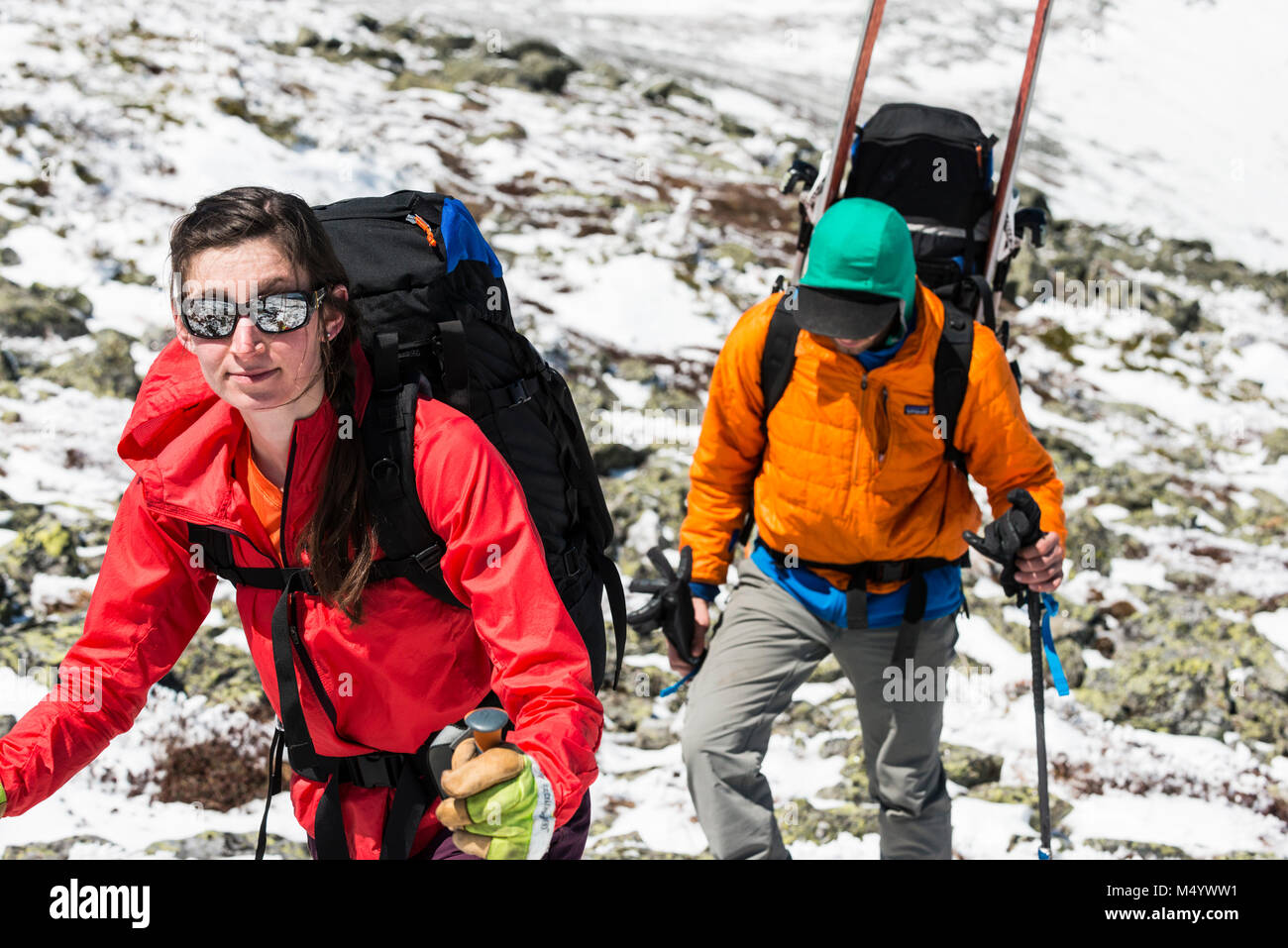 Front view of man and woman hiking in winter in White Mountains, New Hampshire, USA Stock Photo ...