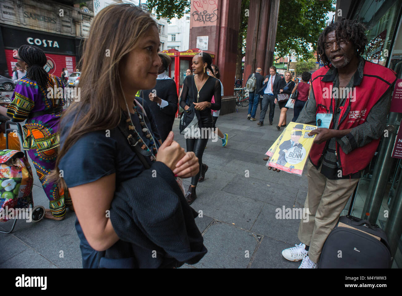 London, United Kingdom. Homeless sells "The Big Issue" magazine ...