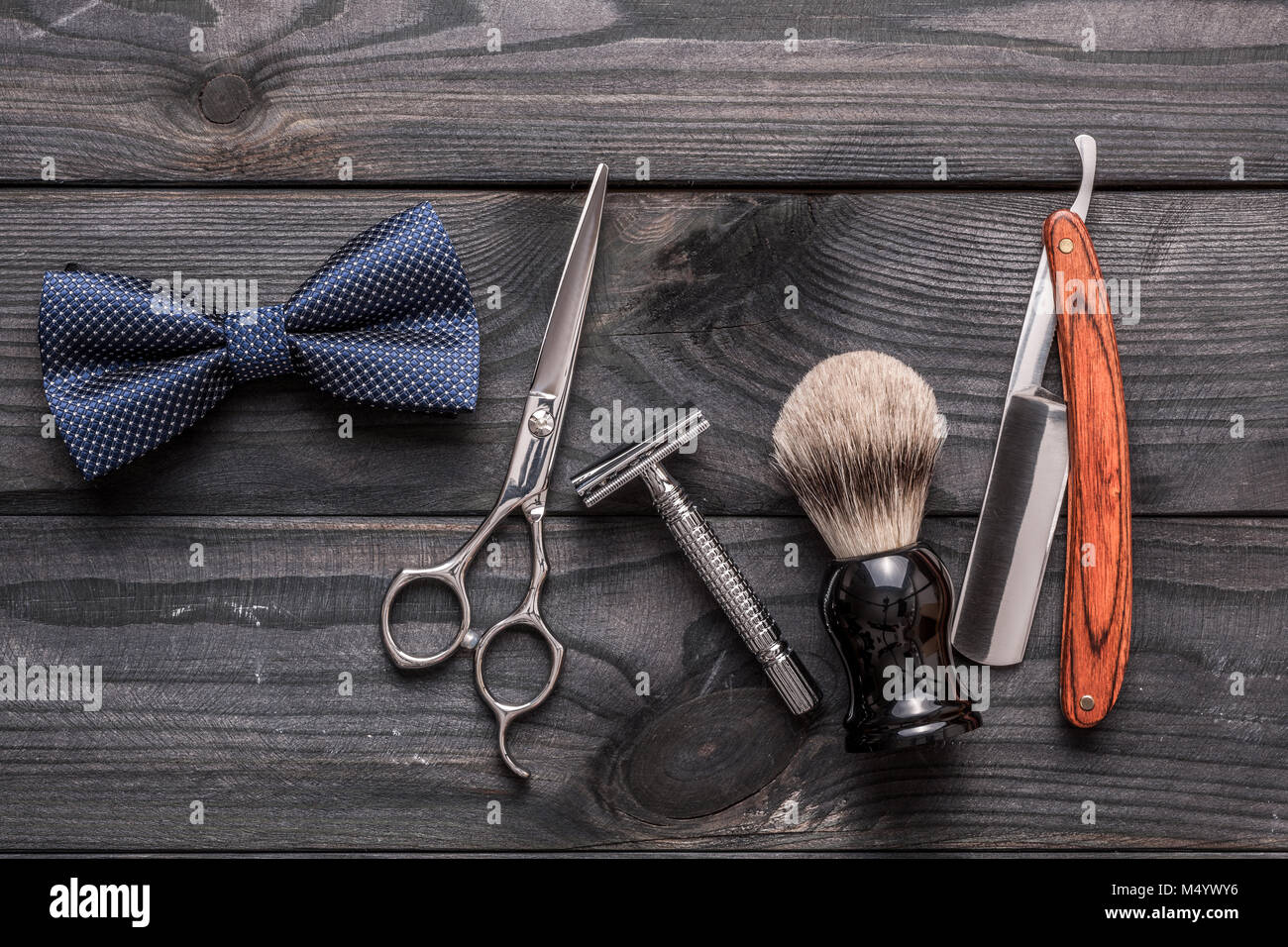 Vintage barber shop tools on wooden background Stock Photo - Alamy