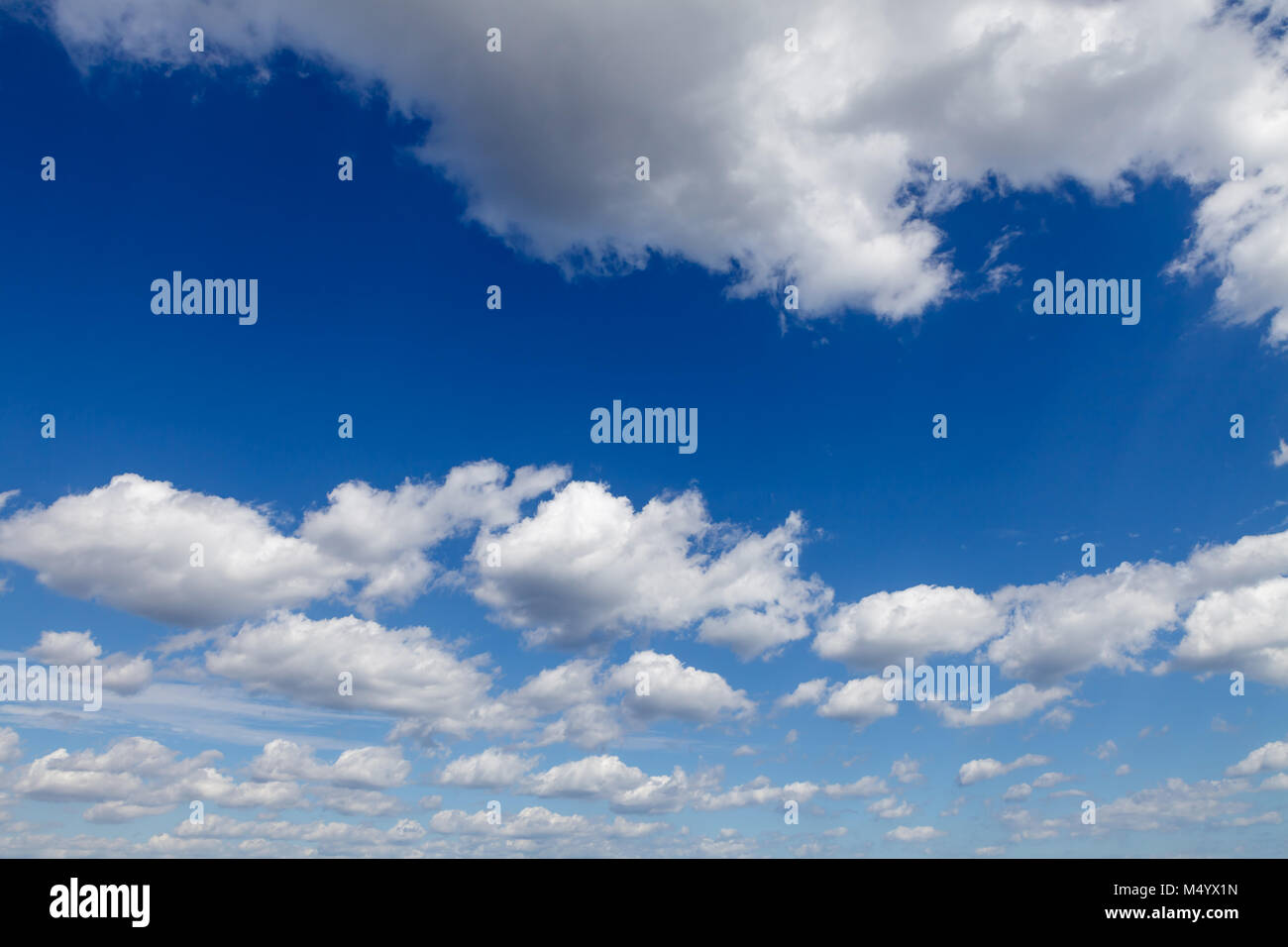 Deep blue sky light clouds hi-res stock photography and images - Alamy