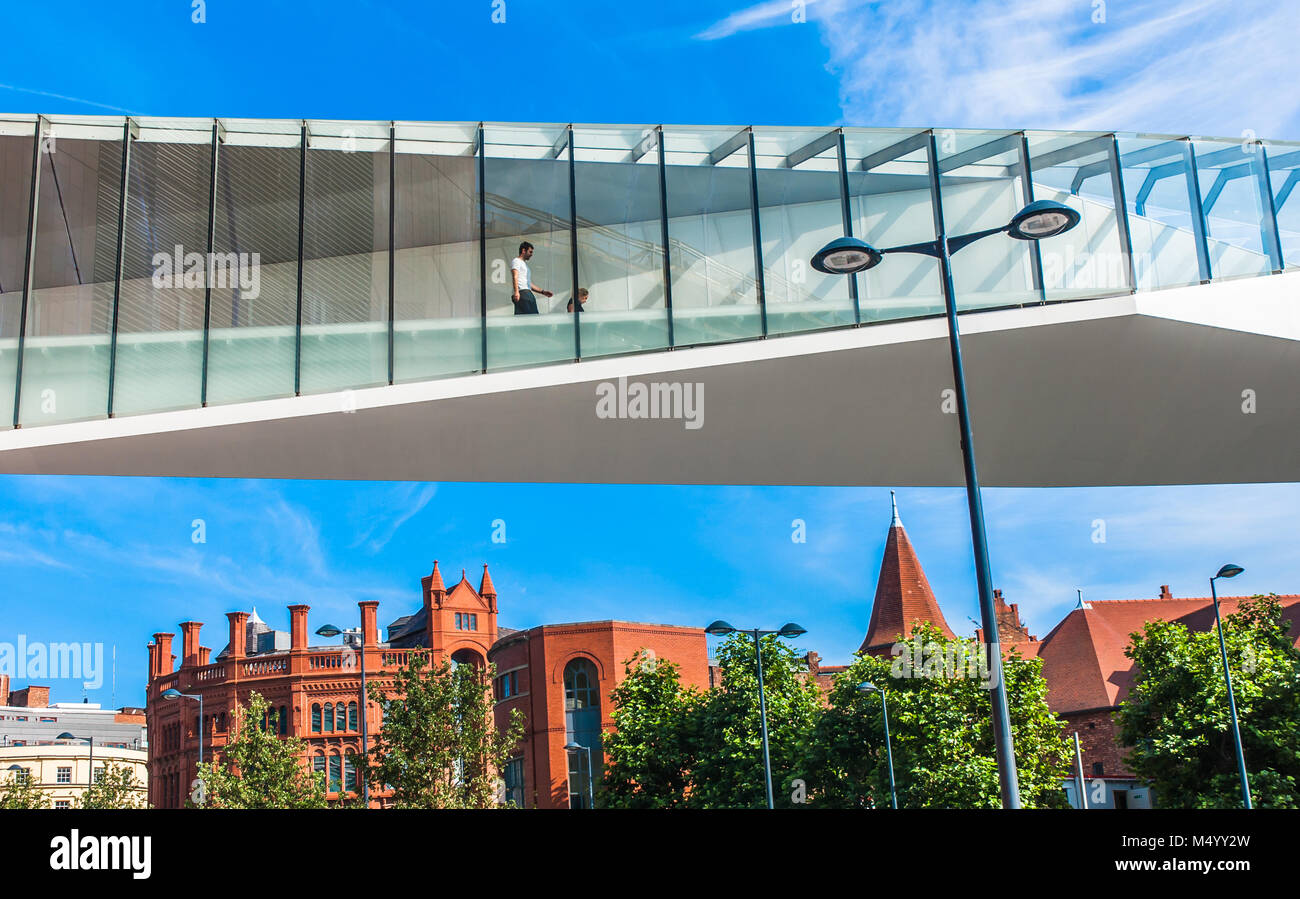 A modern glass bridge that leads to John Lewis department store in ...