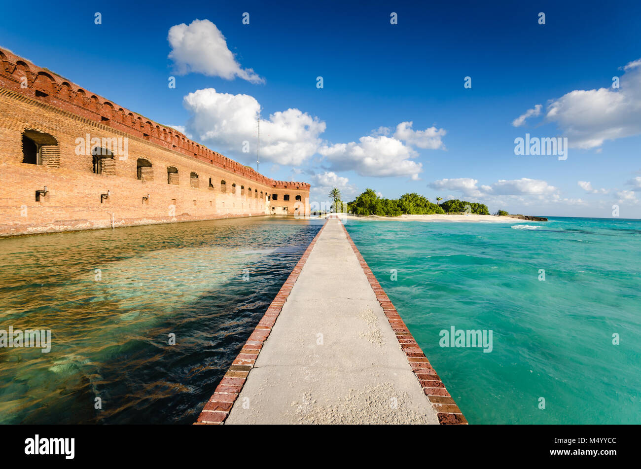 Coral reef fills pool between Fort Jefferson and moat wall, with Garden ...