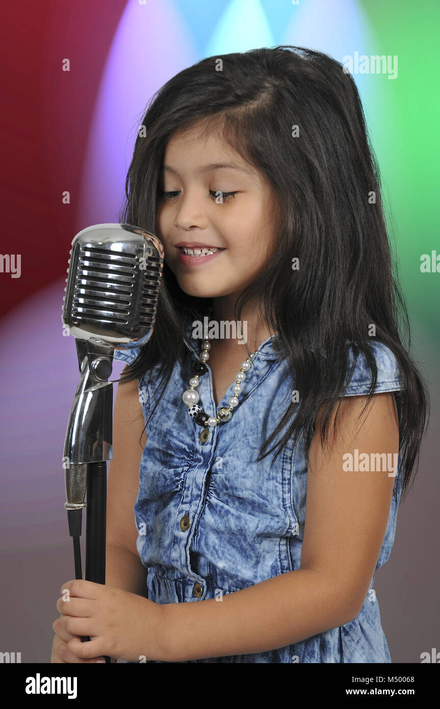 Little Girl Singer Stock Photo - Alamy