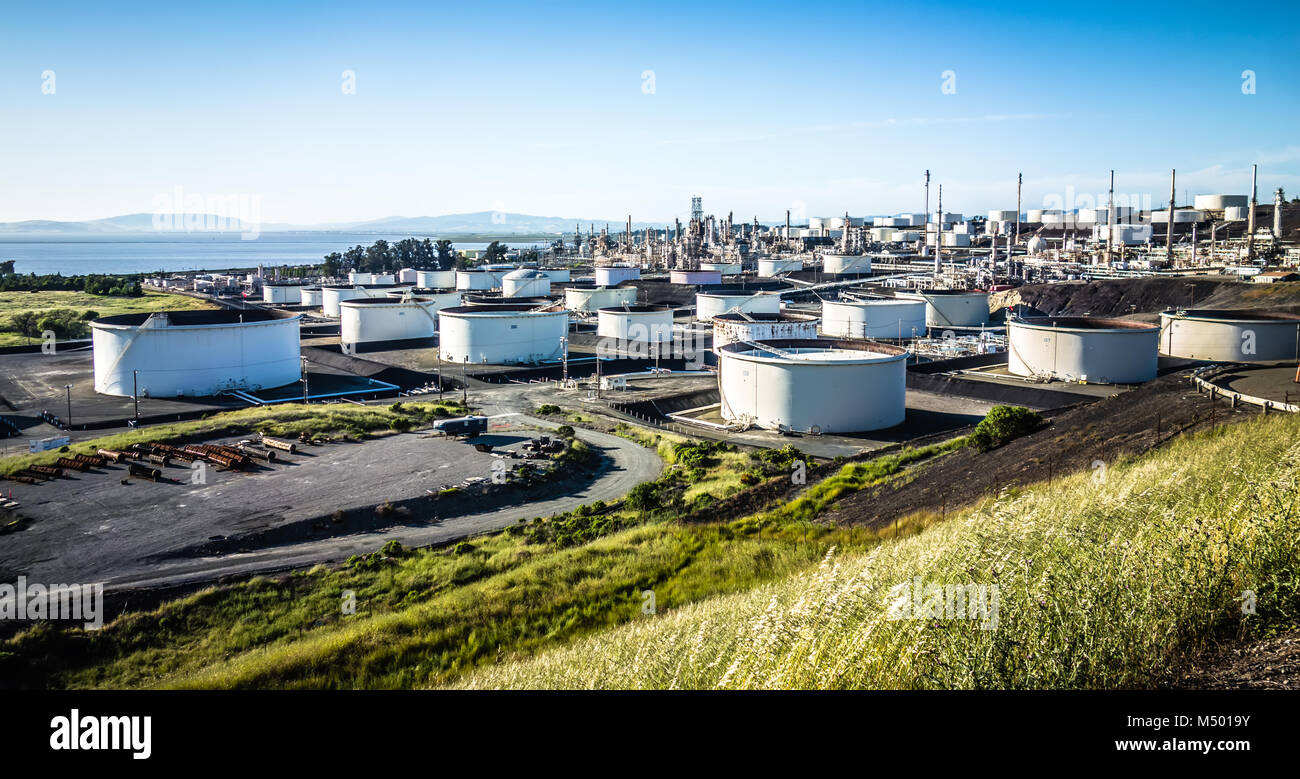 landscape filled with petrol refinery tanks and equipment Stock Photo ...