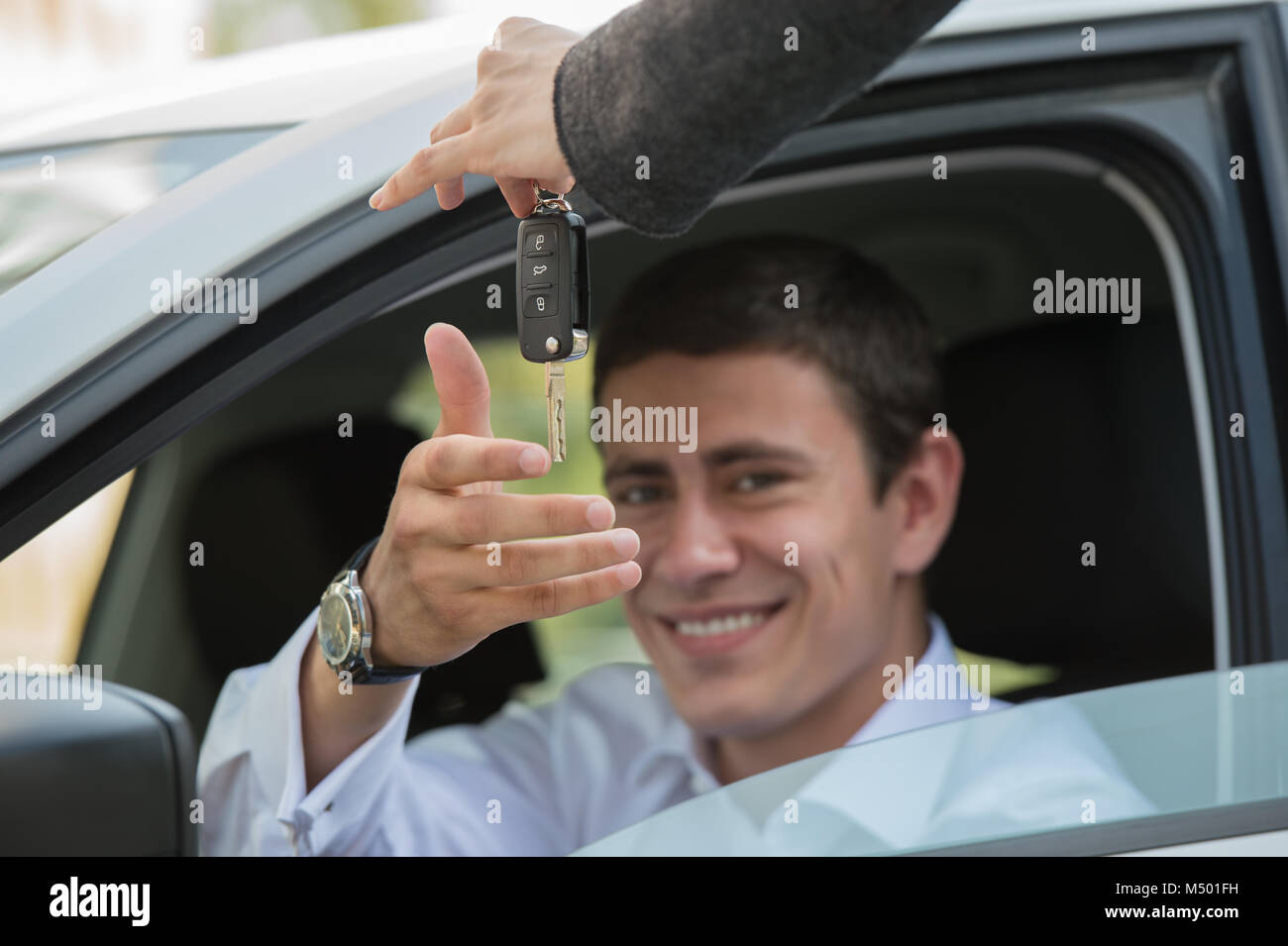 Handing over the car keys hi-res stock photography and images - Alamy