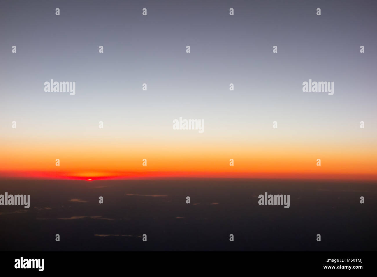 beautiful sunset view from an airplane over land Stock Photo - Alamy