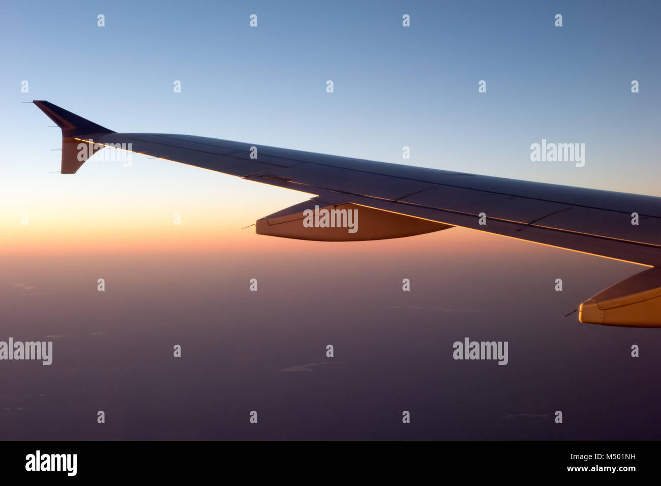 Beautiful sunset with airplane hi-res stock photography and images - Alamy