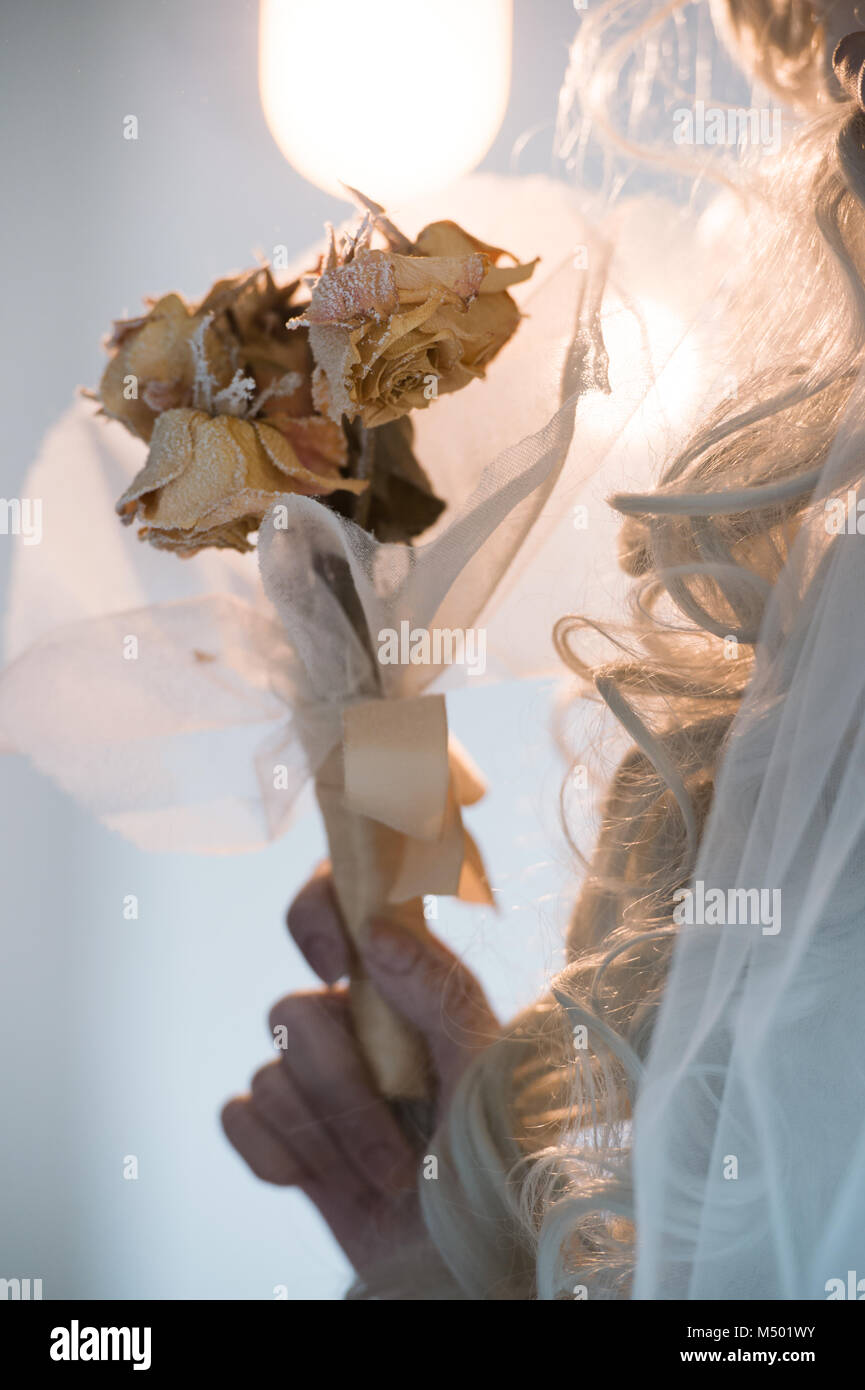 Halloween witch. Beautiful bride woman wearing santa muerte mask and ...