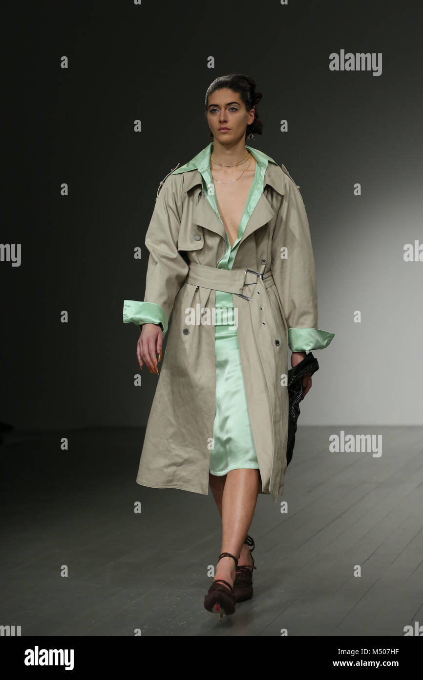 London, UK. 19th Feb, 2018. A model walk the runway at the Faustine ...