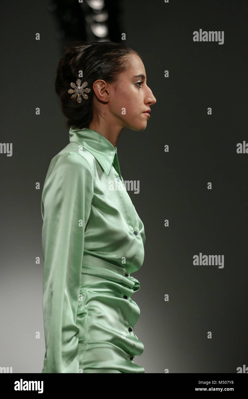 London, UK. 19th Feb, 2018. A model walk the runway at the Faustine ...