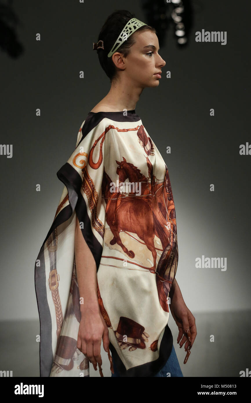 London, UK. 19th Feb, 2018. A model walk the runway at the Faustine ...