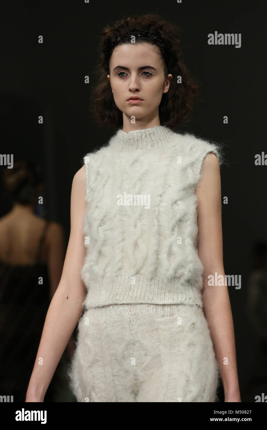 London, UK. 19th Feb, 2018. A model walk the runway at the Faustine ...