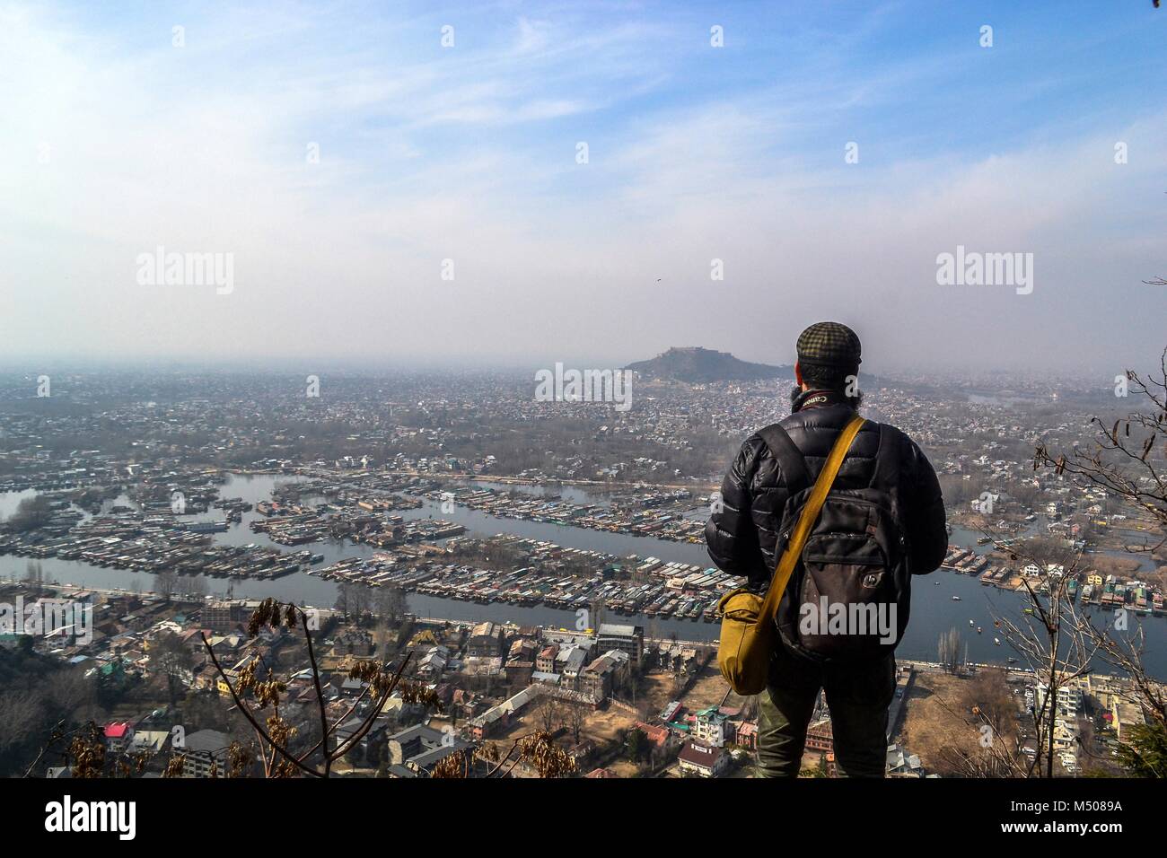 February 19, 2018 - Srinagar, India - A Kashmiri man enjoys a scenic ...