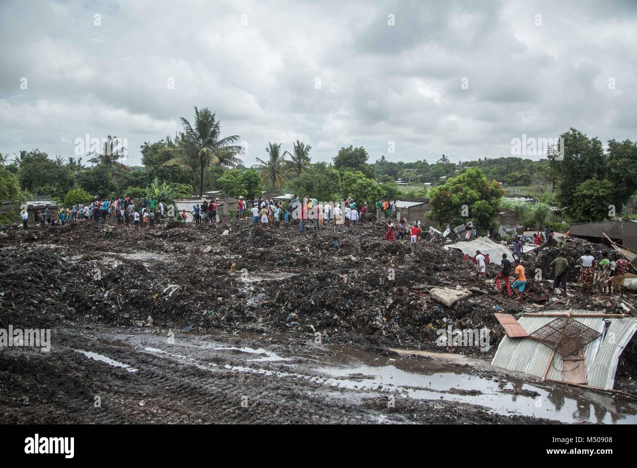 Maputo, Mozambique. 19th Feb, 2018. People gather on the site of a ...