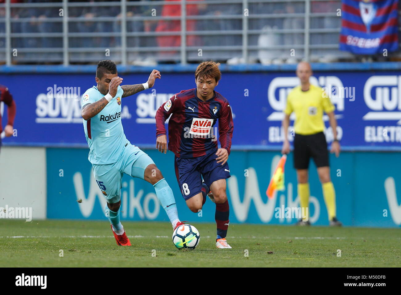 Eibar, Spain. 17th Feb, 2018. (L-R) Paulinho (Barcelona), Takashi Inui ...
