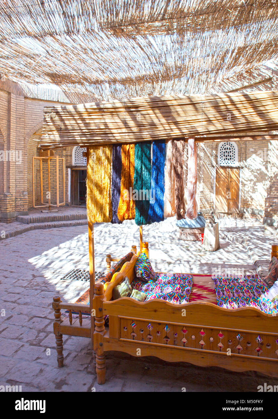Hand made carpets, traditional Uzbek handwork, in the small bazaar ...