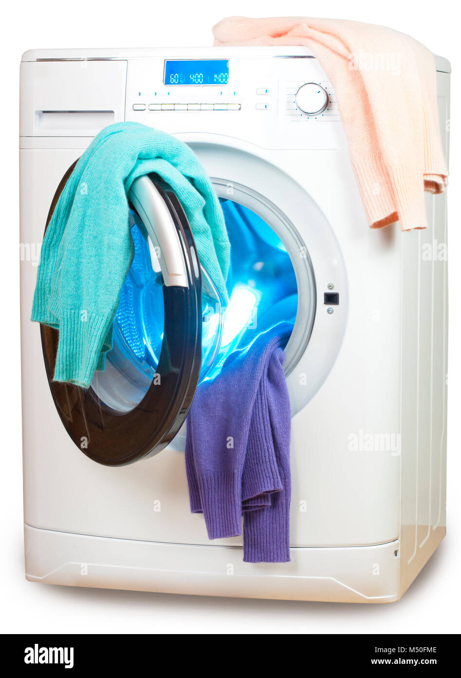 The washing machine with an open door and linen Stock Photo - Alamy