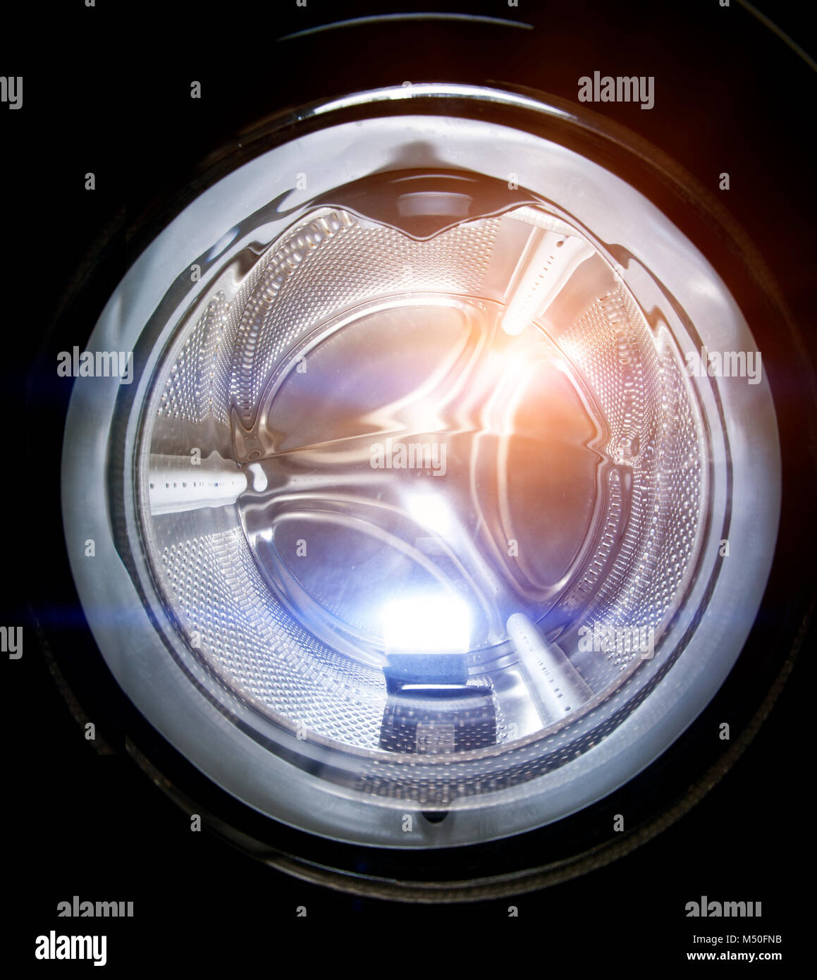 Washing machine. A open loading hatch close up Stock Photo - Alamy