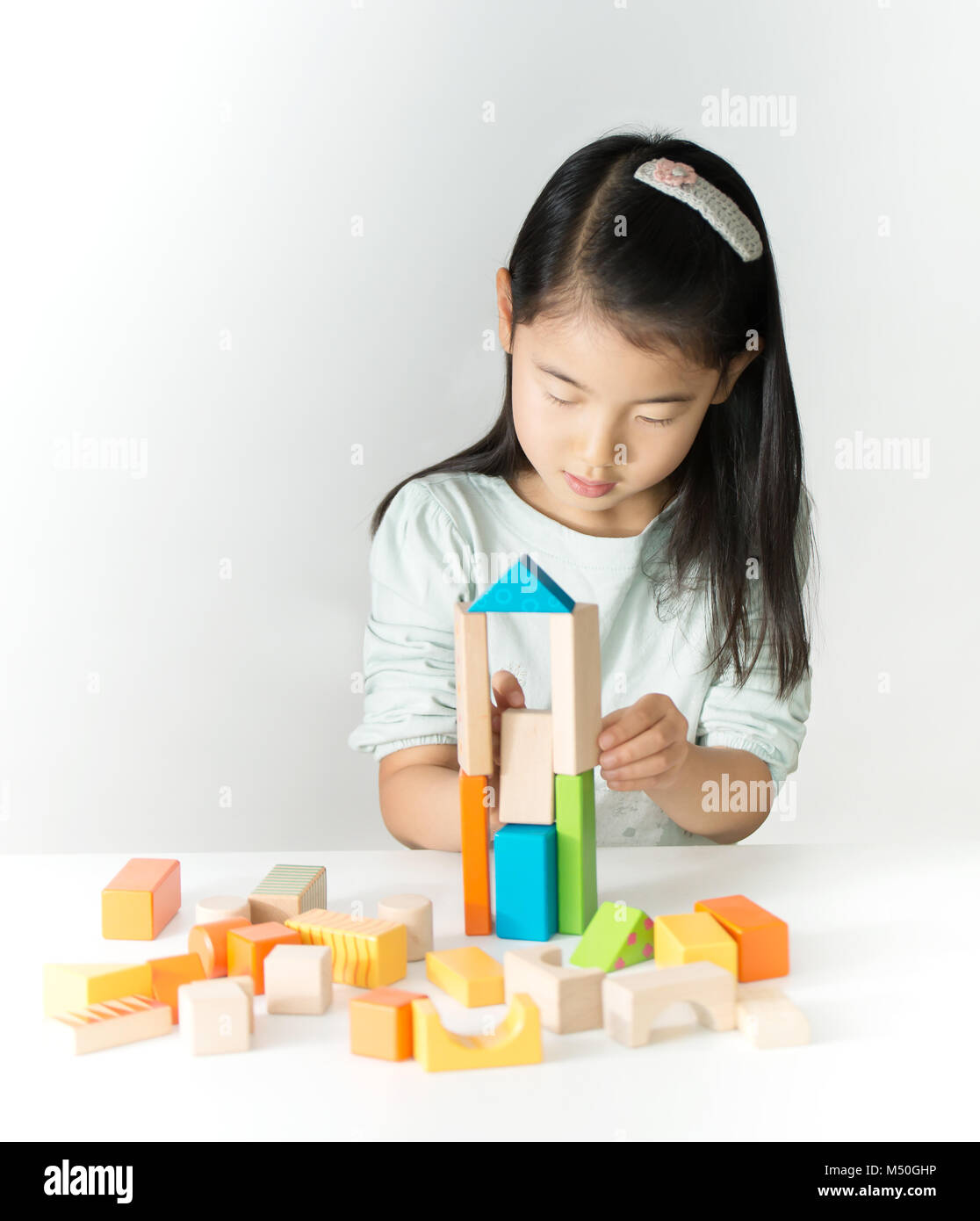 Child wood blocks hi-res stock photography and images - Alamy