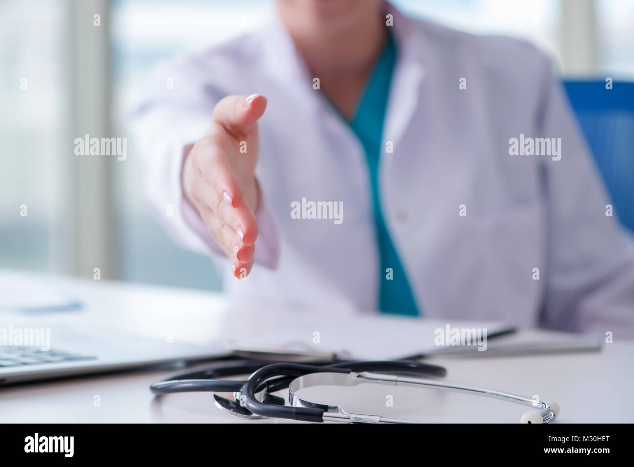 Cooperation with doctor in medical concept Stock Photo - Alamy