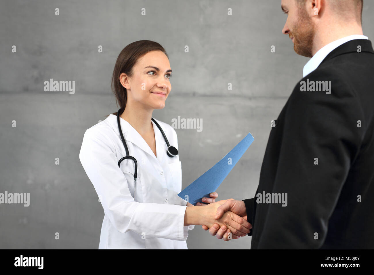 Promotion. The hospital director appoints staff Stock Photo - Alamy