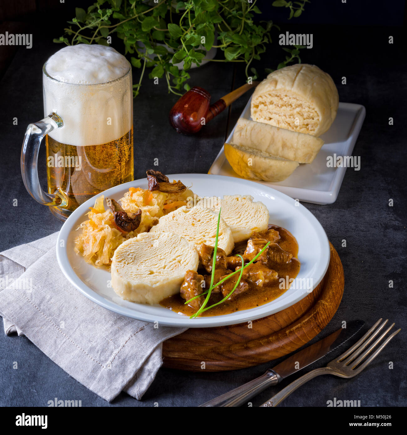 Original Czech dumpling with goulash Stock Photo - Alamy