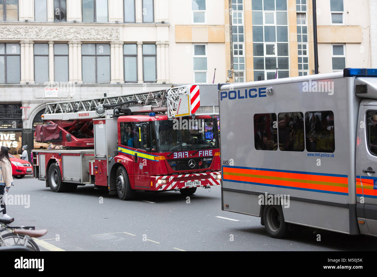 Fire engine and Police van Stock Photo - Alamy