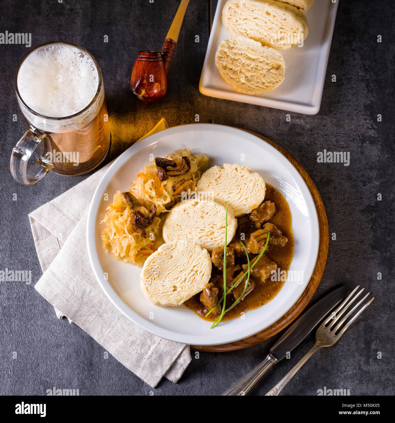 Original Czech dumpling with goulash Stock Photo - Alamy