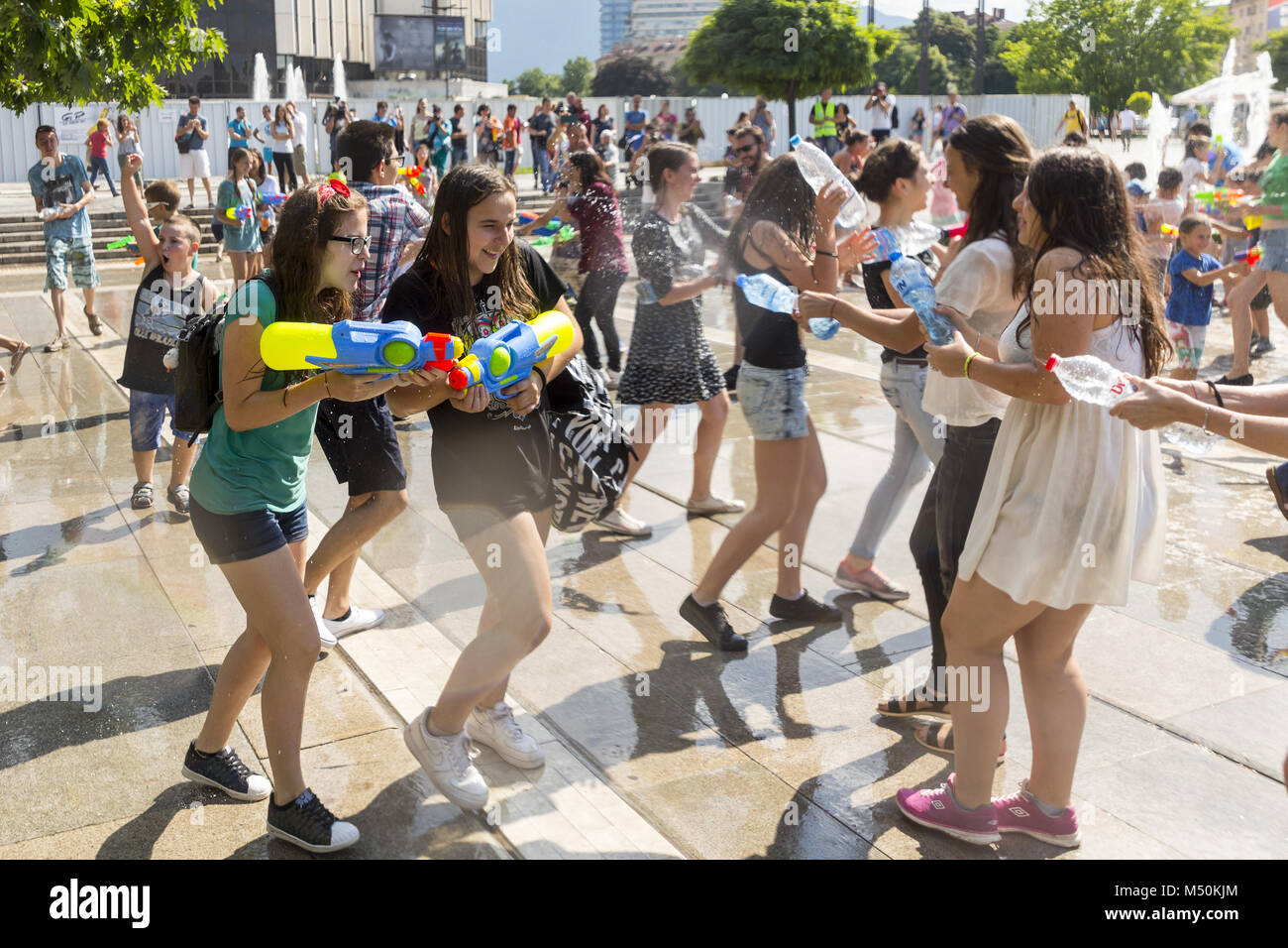 Water gun fight summer Stock Photo - Alamy