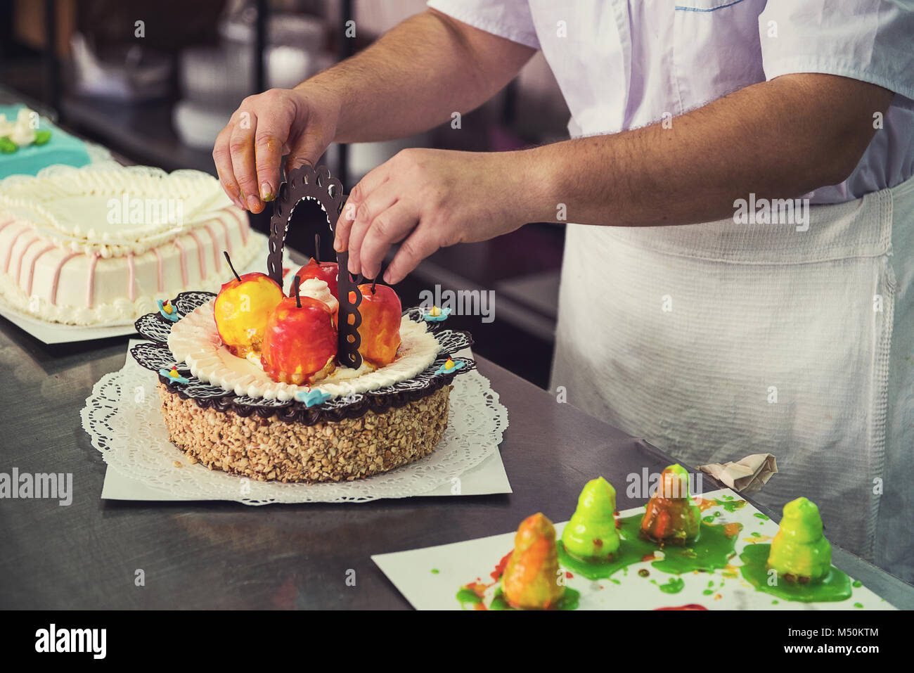 Manual cakes production Stock Photo - Alamy