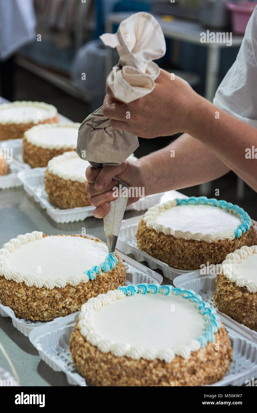 Manual cakes production hi-res stock photography and images - Alamy