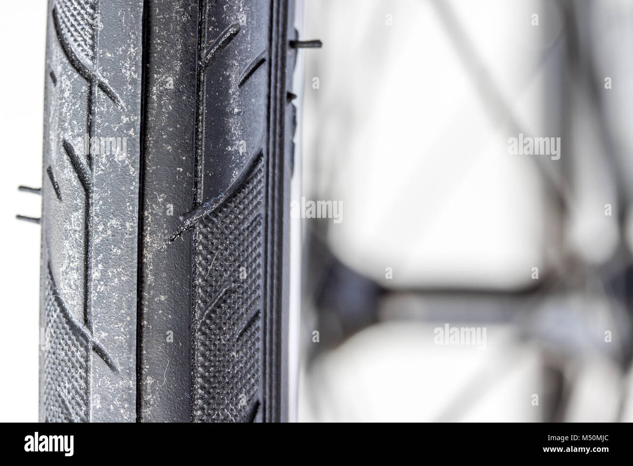 Close-up view and tread pattern of the bicycle. Detail of tire from ...