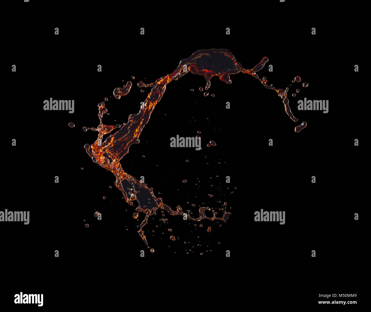 splash of ink isolated on black background. golden splash close-up ...