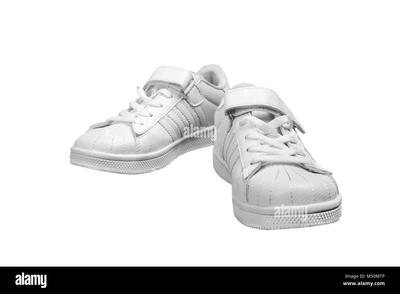 White sneakers isolated on white background Stock Photo - Alamy
