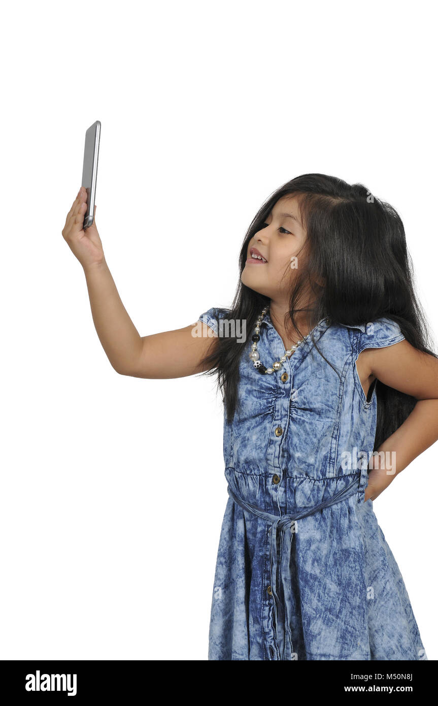 Little Girl Using Cell Phone Stock Photo - Alamy