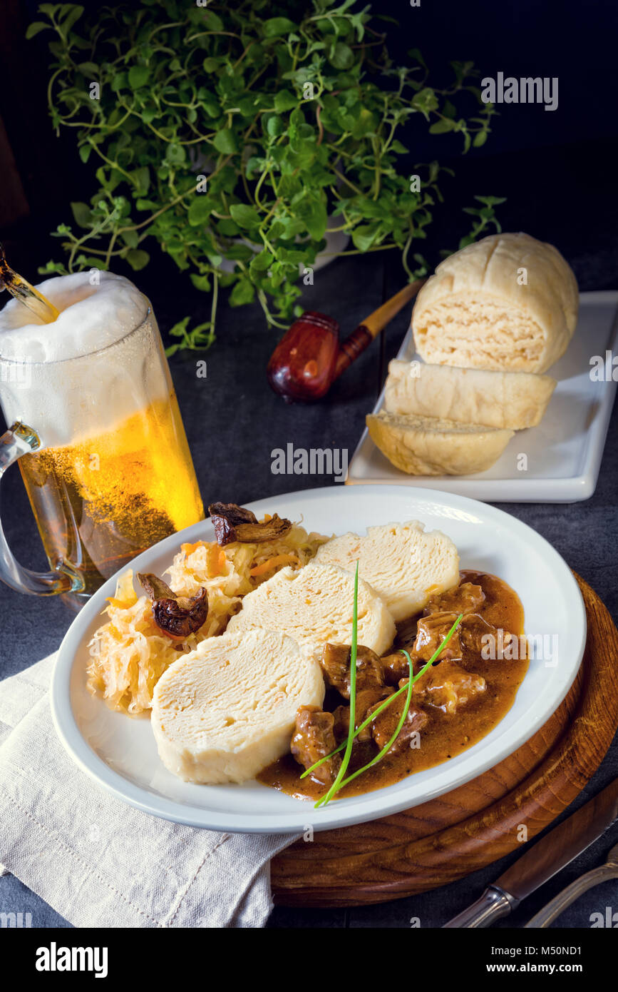 Original Czech dumpling with goulash Stock Photo - Alamy