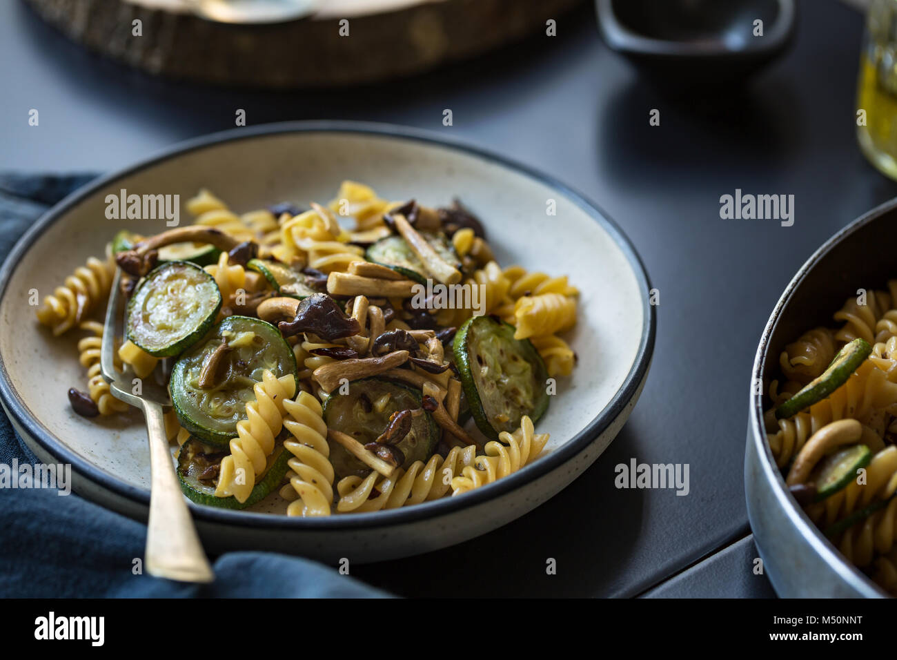 Fusilli with Mushroom , Garlic and Zucchini Stock Photo - Alamy