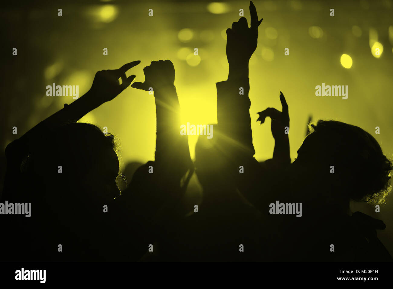 Hands of people in a nightclub at a party Stock Photo - Alamy