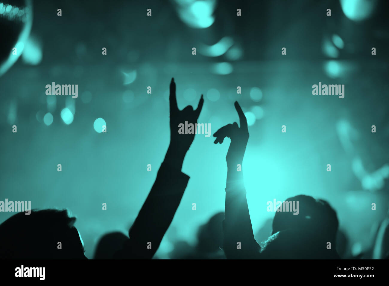 Hands of people in a nightclub at a party Stock Photo - Alamy