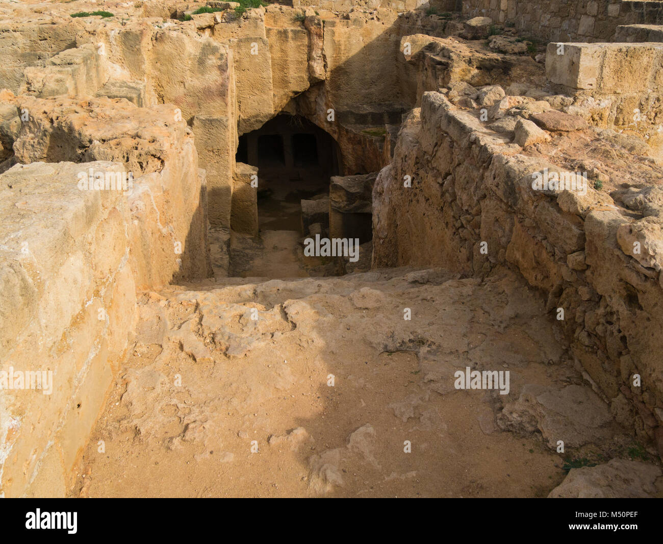 Tombs of the Kings peristyle atrium with covered dromas of twelve steps ...
