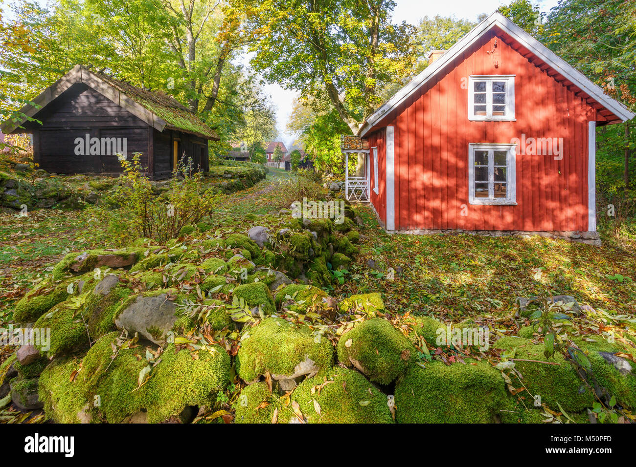 Rural idyll with cottages in the fall Stock Photo - Alamy