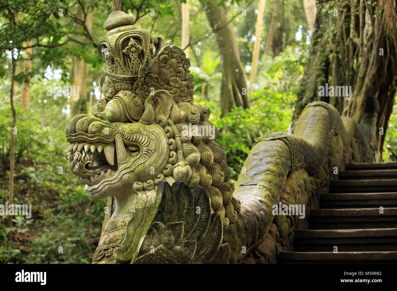 Balinese stone statue Stock Photo - Alamy
