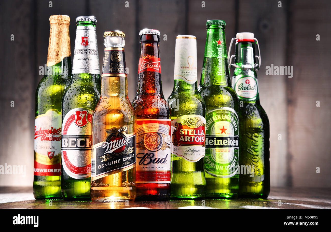 Bottles of assorted global beer brands Stock Photo - Alamy