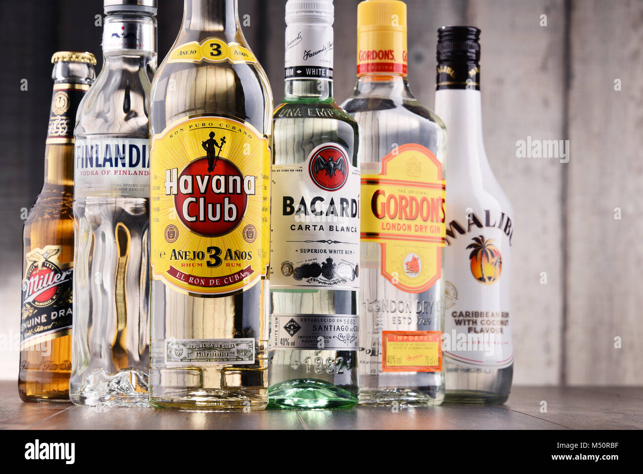 Bottles of assorted global hard liquor brands Stock Photo - Alamy