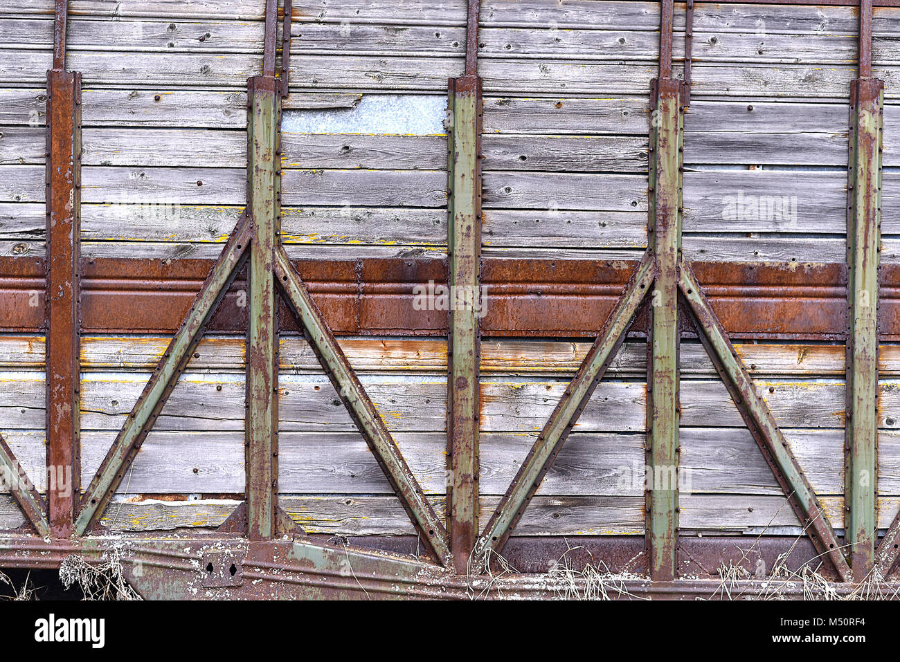 Texture of old wooden wall of the garage Stock Photo - Alamy