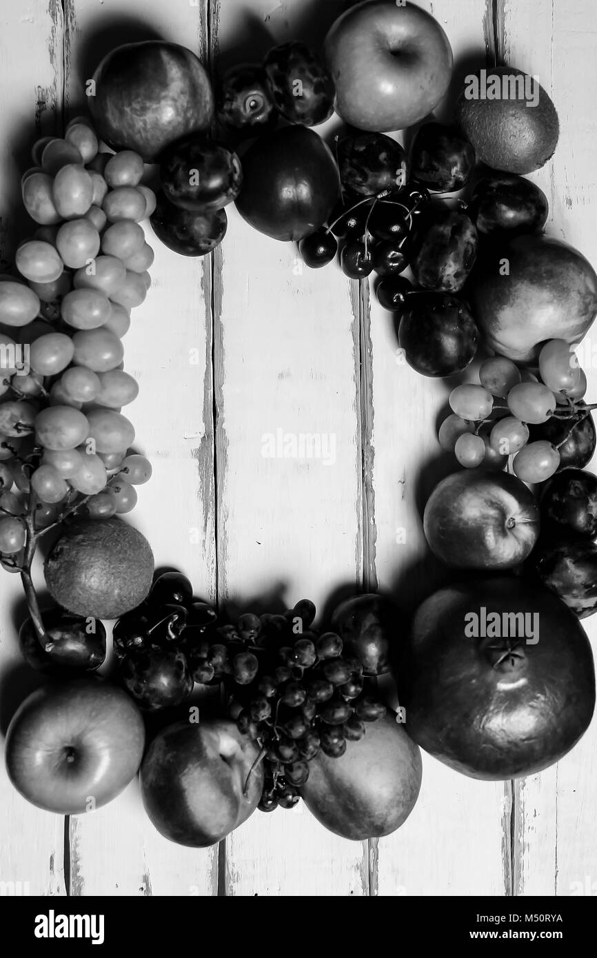 Frame of fruit on the table black and white poster Stock Photo - Alamy