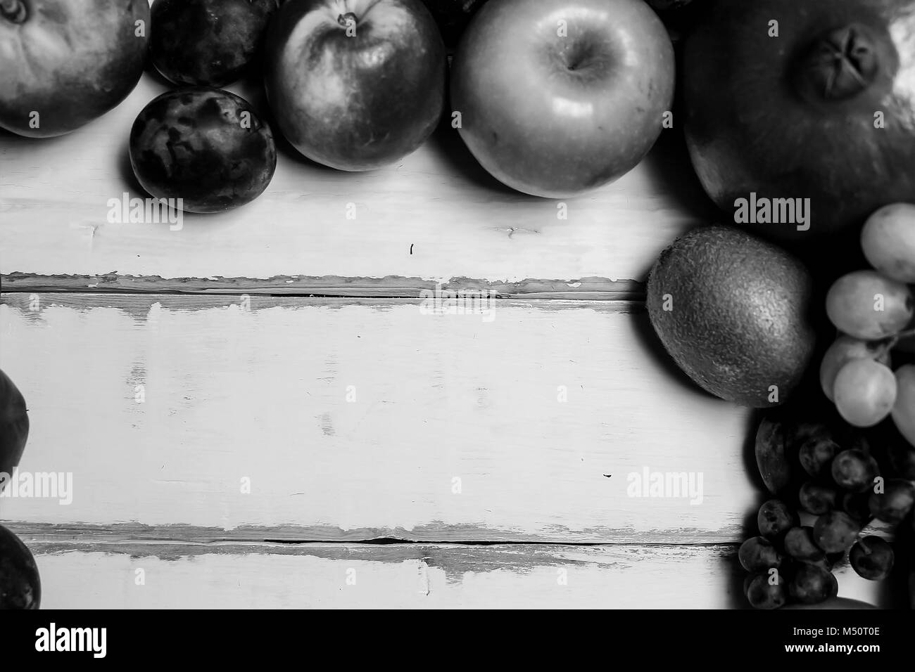 Frame of fruit on the table black and white poster Stock Photo - Alamy