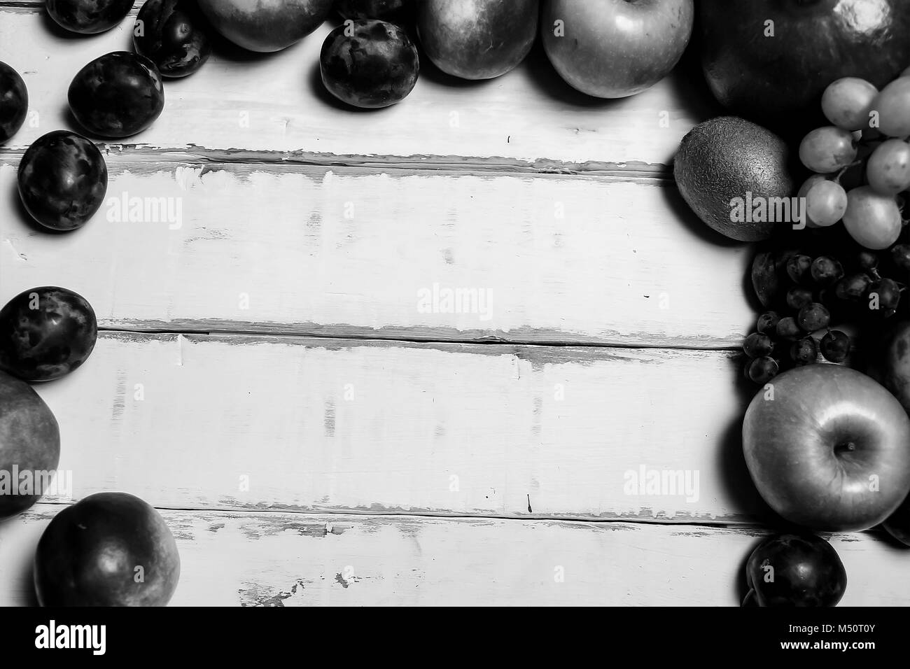 Frame of fruit on the table black and white poster Stock Photo - Alamy
