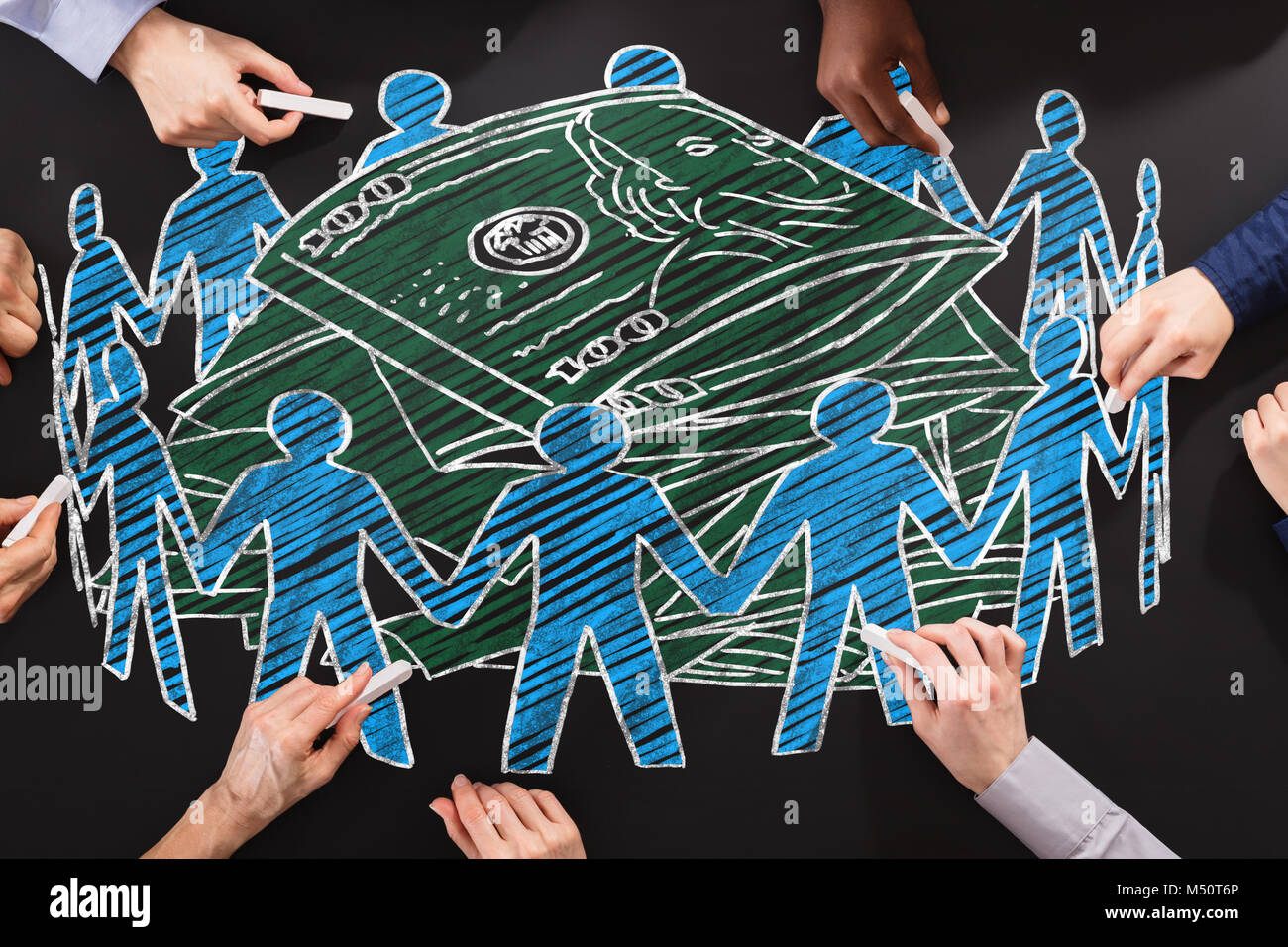 Group Of People Drawing Crowdfunding Concept On Blackboard Stock Photo ...