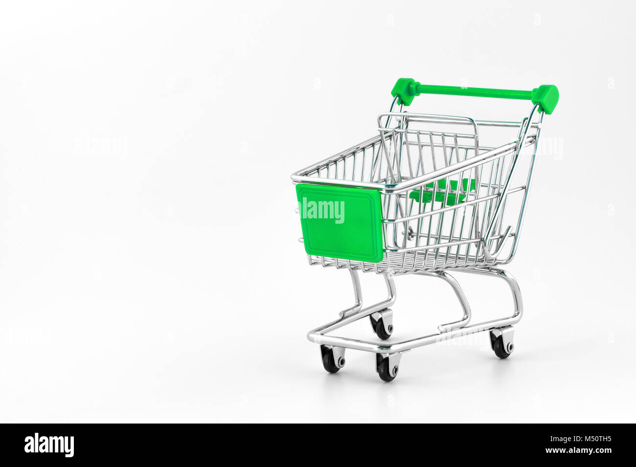 Small metal shopping cart Stock Photo - Alamy